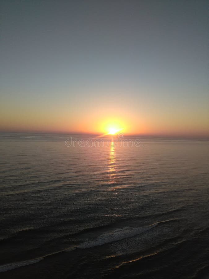 Sun rising stock image. Image of rising, afterglow, water - 84679125