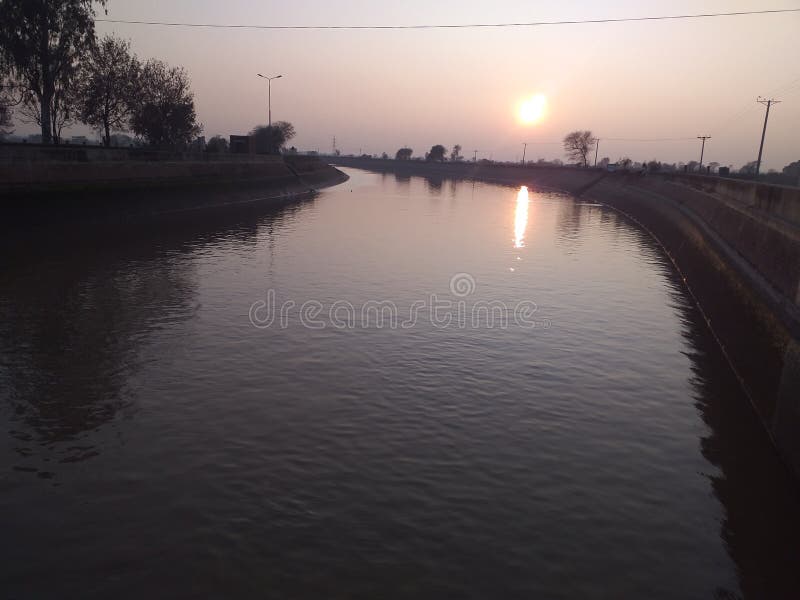 The Sun Rising in the River Side of Neck Stock Image - Image of river ...