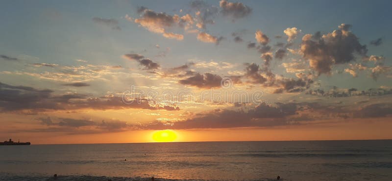 Sun rising from the sea stock image. Image of dusk, morning - 218840283