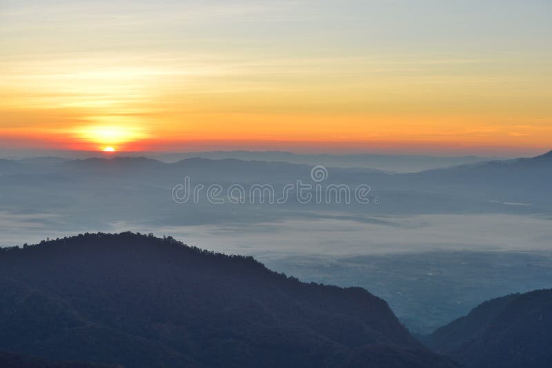 Sun Rising on the Sky Over Beautiful Mountains Stock Photo - Image of ...