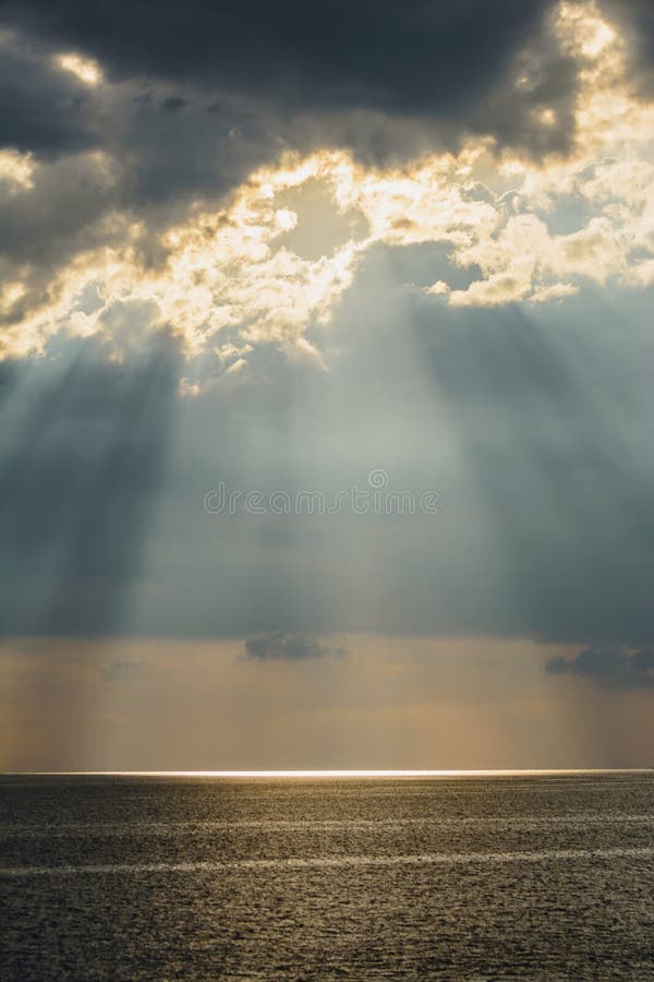 Sun`s Beam through Heavy Sky Over the Sea Stock Photo - Image of summer ...