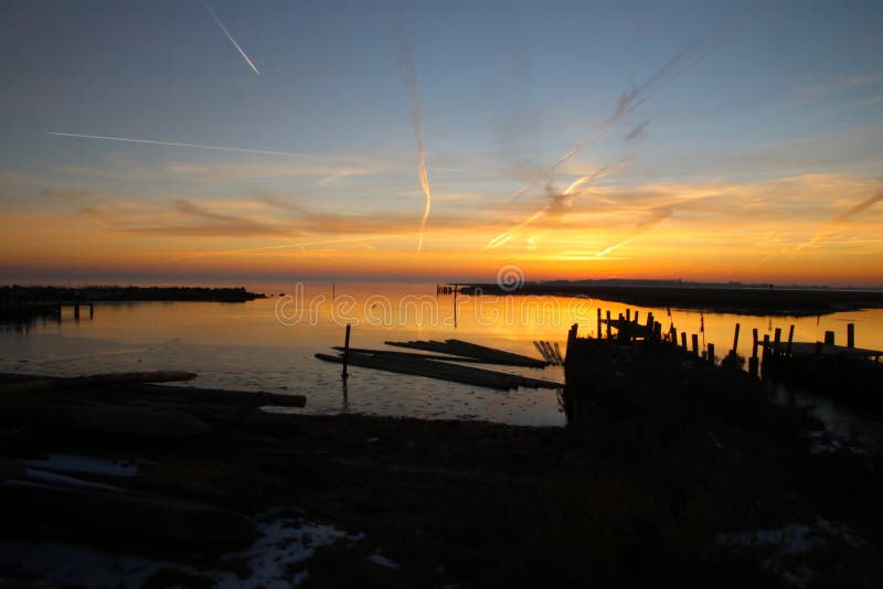 The Sun`s Last Light at Sunset Over the Small Port Stock Photo - Image ...