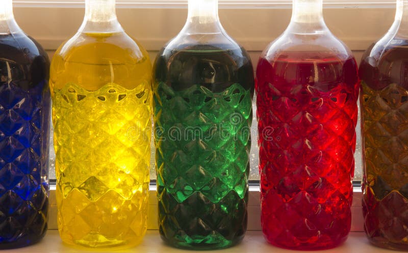 Colored plastic bottles stock image. Image of chiaroscuro - 149922355