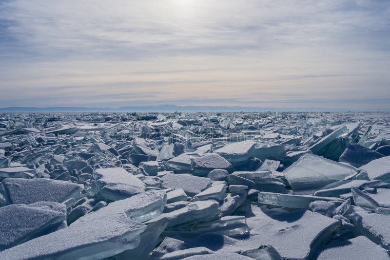 The Sun S Rays are Refracted in Crystal Clear Pieces of Ice. Winter ...