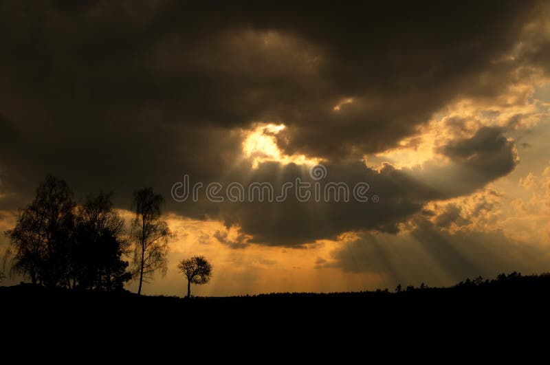 The Sun`s Rays Shine through the Clouds Stock Photo - Image of evening ...
