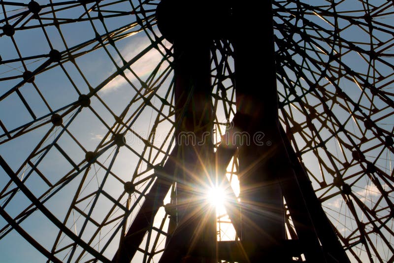 The Sun`s Rays Shine through the Construction of a Carousel. Stock ...