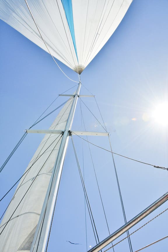 Sun in sails and mast stock image. Image of sailboat - 15577743