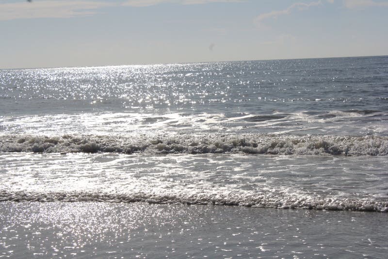 Sun, sand and water stock photo. Image of water, sand - 156846832