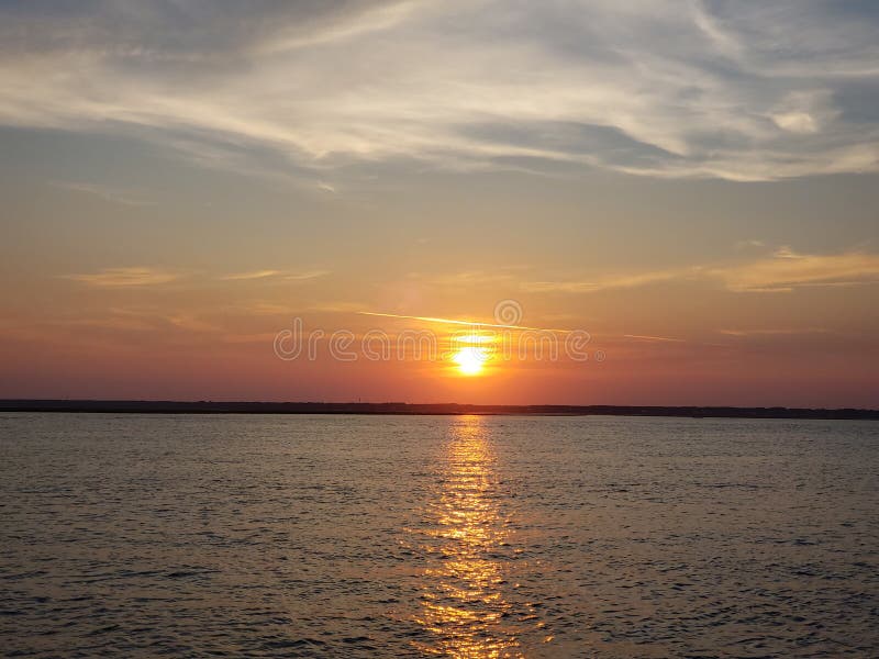 Sun set at the beach stock photo. Image of dusk, sunrise - 189486782