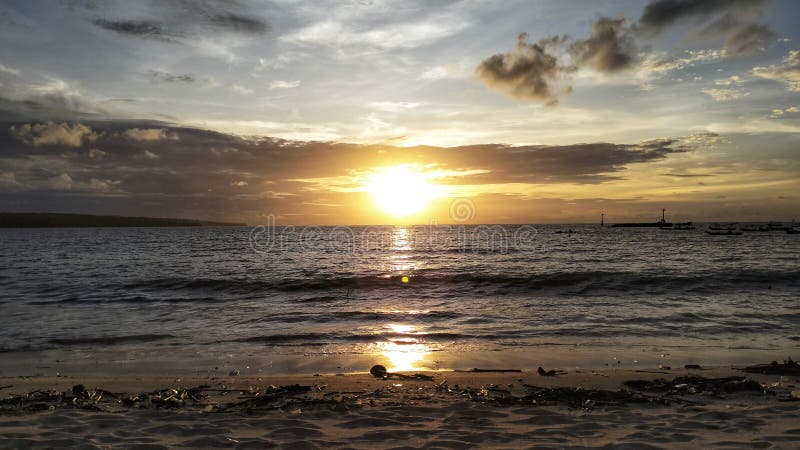 Sun set at the beach stock photo. Image of morning, sunlight - 266256818