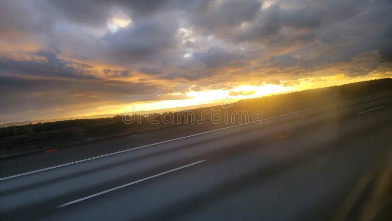 Sun set on the drive stock photo. Image of reflection - 252470626