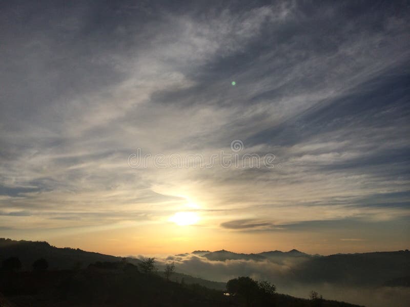 Sun set with fog stock image. Image of sunset, highland - 42919473