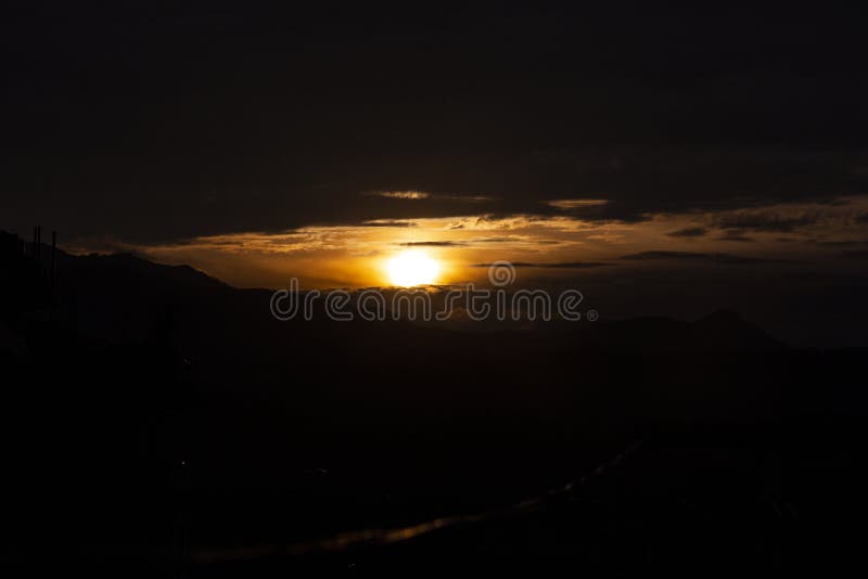 Sun set over the mountains stock image. Image of view - 190134663