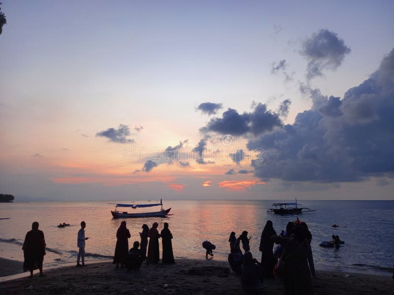 SUN SET in PASIR PUTIH BEACH Editorial Photography - Image of shore ...