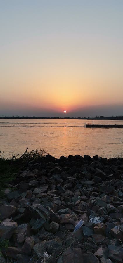 Sun set river stock photo. Image of sunlight, horizon - 260496808