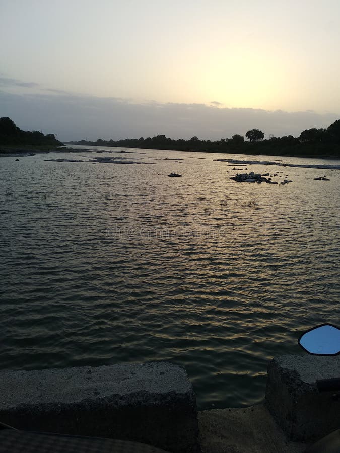 Sun set at river stock photo. Image of water, night - 152919688