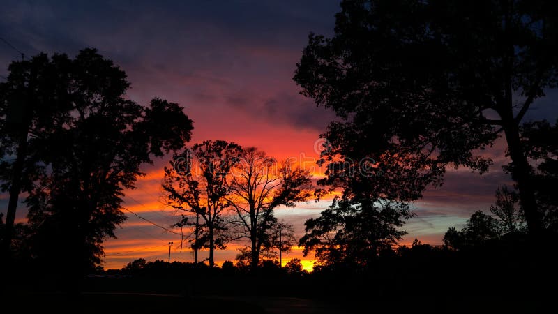 Sun set stock image. Image of clouds, dusk, trees, silouette - 85375763