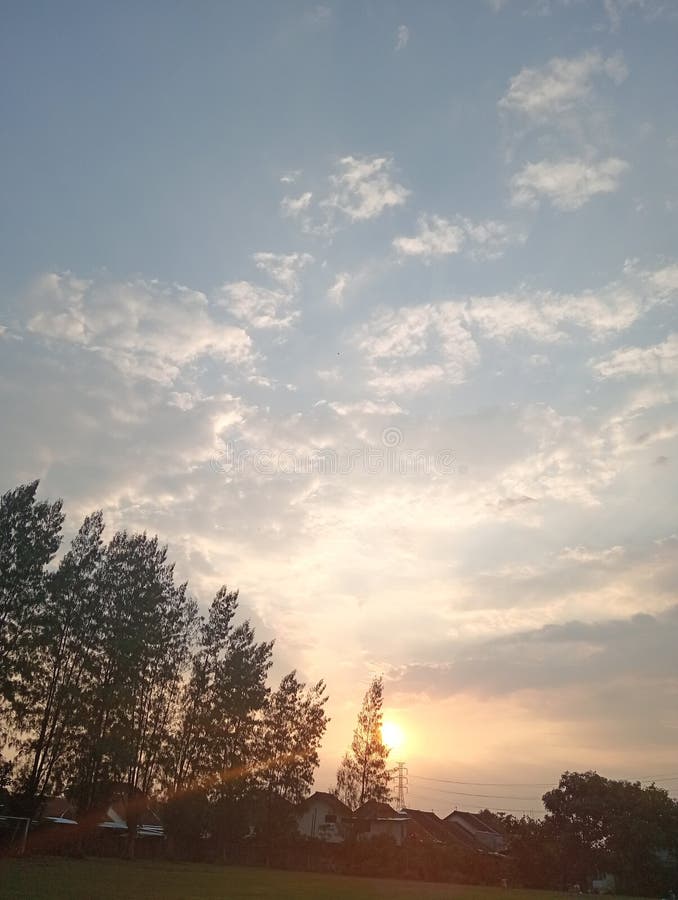 The Sun Sets in the Afternoon in the Field Stock Image - Image of ...