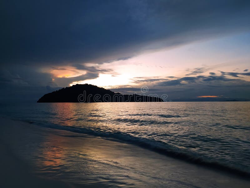 The Sun Sets on the Back of a Little Island Stock Image - Image of ...