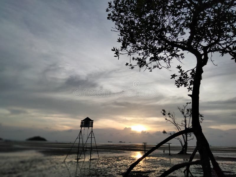 The Sun Sets at Batam Beach, Indonesia Stock Image - Image of beach ...