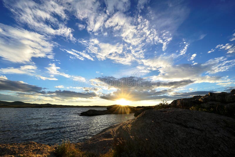 The Sun Sets Behind the Horizon at a Beach in Australia Stock Image ...