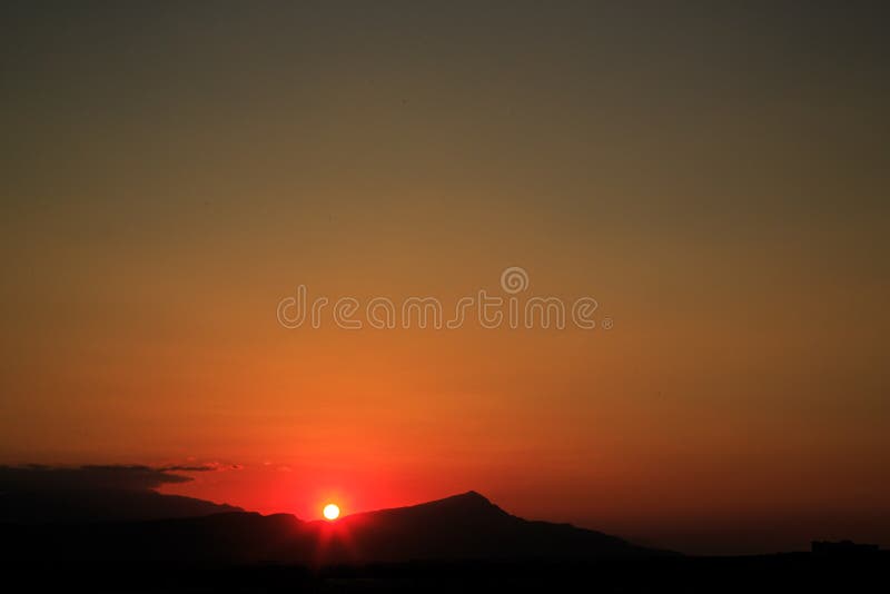 The Sun Sets Behind the Mountains. Beautiful Panorama and View of the ...