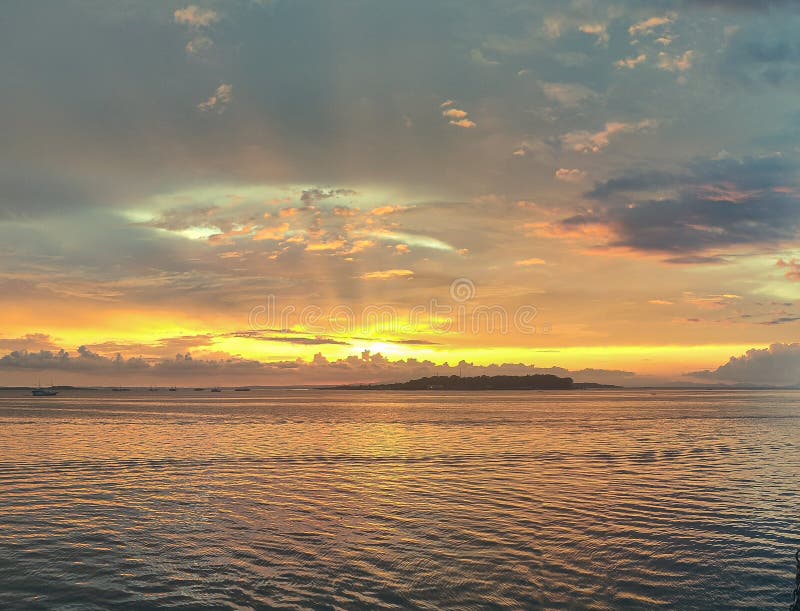 The Sun Sets in the Middle of the Sea, You Can See the Islands in the ...