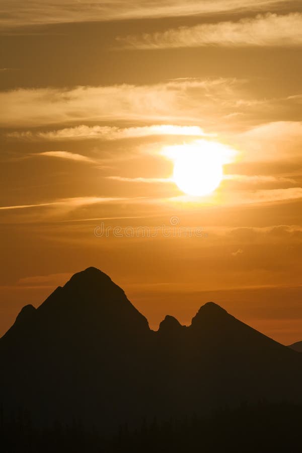 The Sun Sets Over the Mountain Peaks Stock Photo - Image of national ...