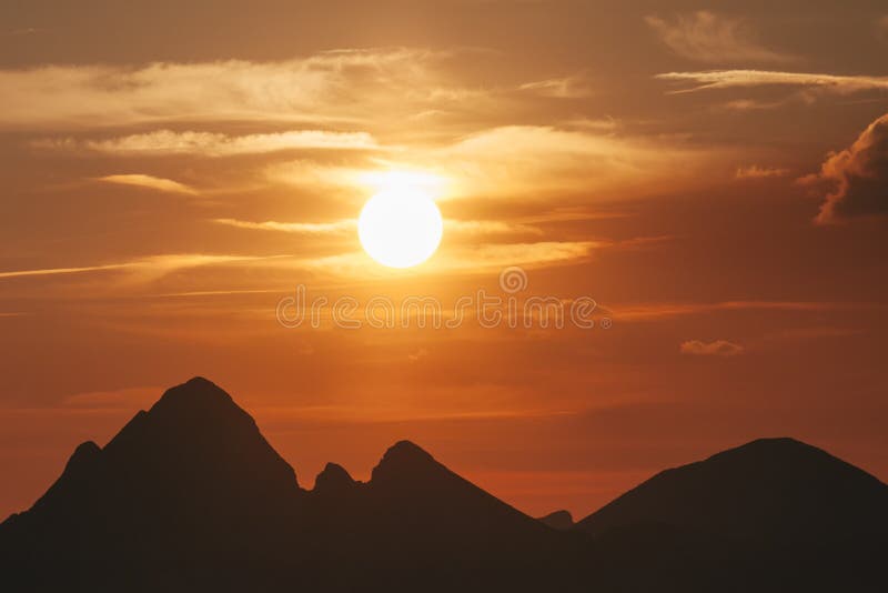 The Sun Sets Over the Mountain Peaks Stock Photo - Image of park ...