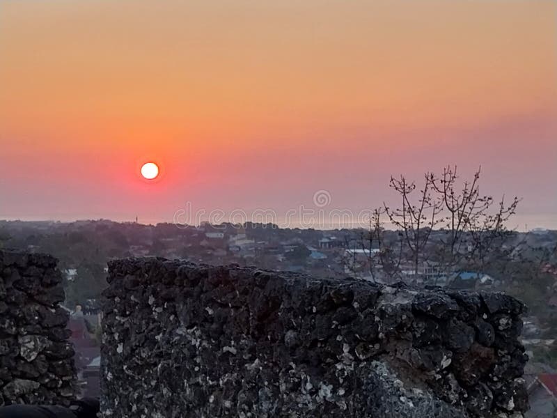 The Sun Sets Over the Palace Fortress of the Buton Sultanate Stock ...