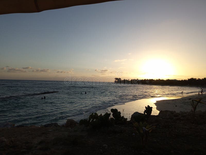 The sun sets over the sea stock photo. Image of horizon - 267712026