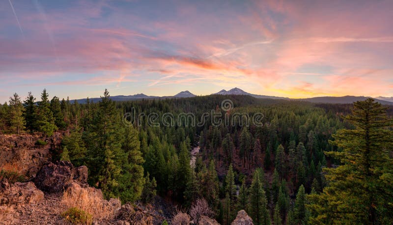 The Sun Sets Over Three Sisters Mountains in Bend Oregon Stock Image ...