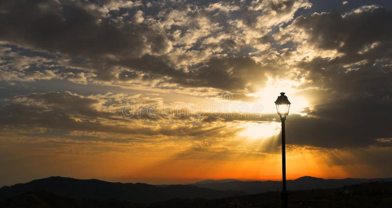 Sunbeams, Viewed through a Solitary Lamp Post, Sedella, Spain. Stock ...