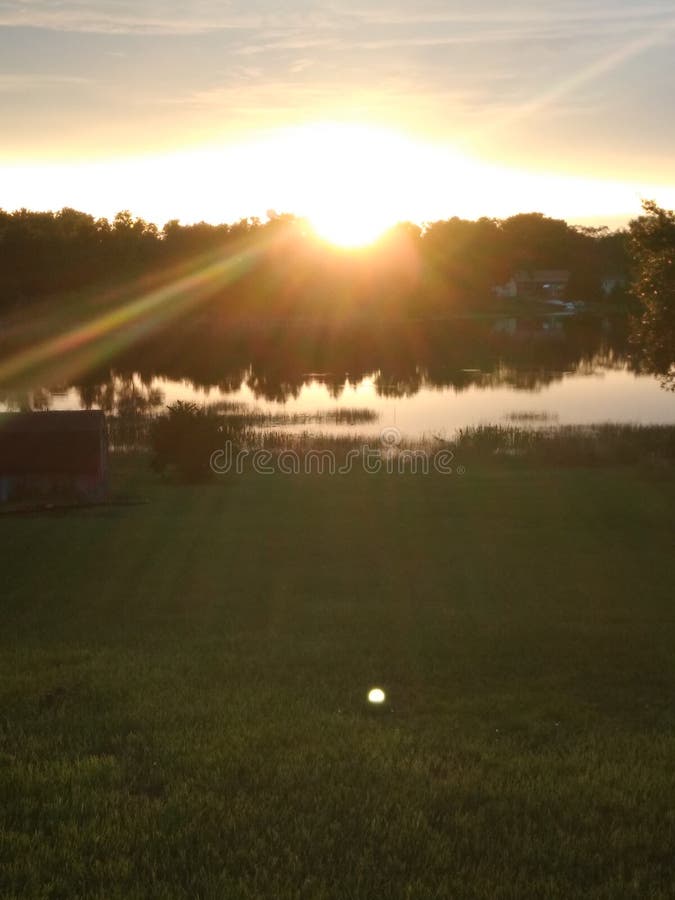 The Sun Setting Across the Sand Dunes Stock Image - Image of sandy ...