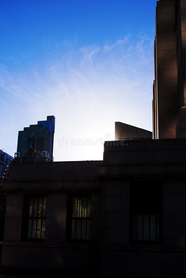 Sun Setting Behind Buildings Stock Photo - Image of city, setting: 45932854