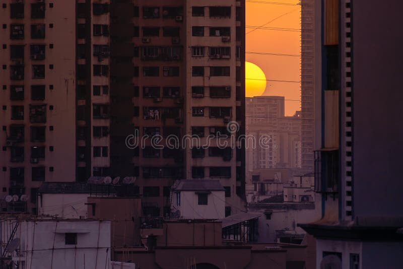 Sun Setting Behind Buildings in Mumbai Stock Image - Image of ...