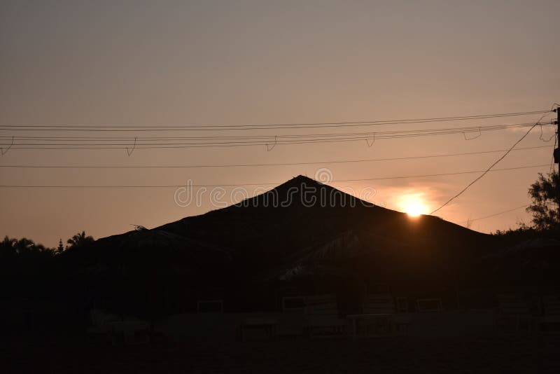 Sun Setting Behind a Hut Near the Beach Stock Image - Image of park ...