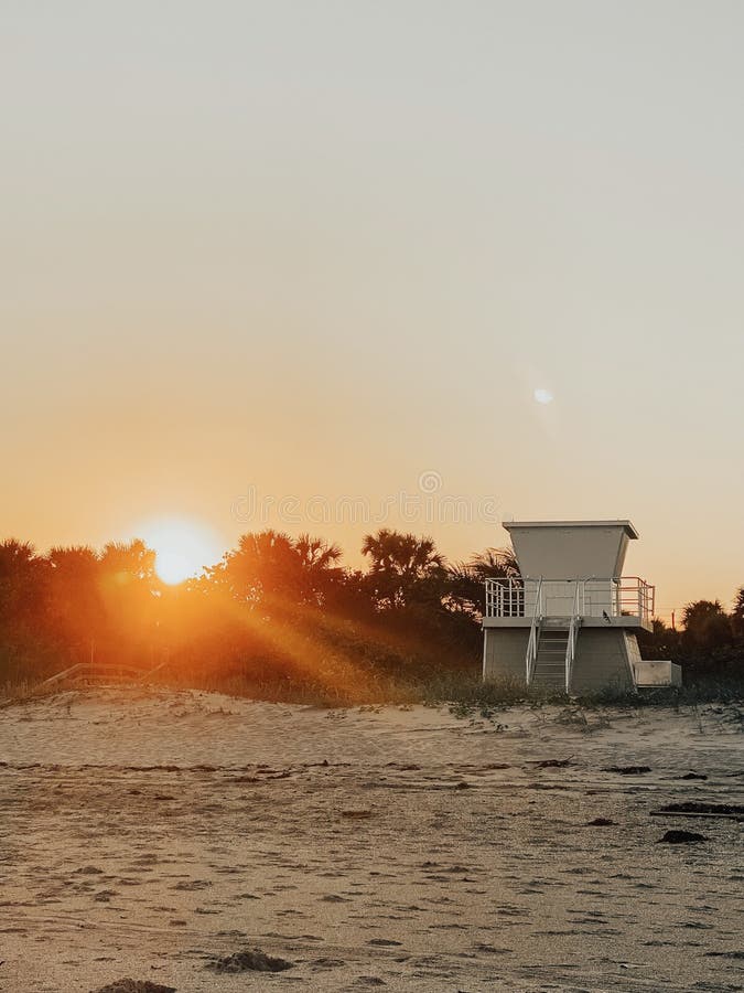 Sun Setting on Another Day stock photo. Image of lifeguard - 273261790