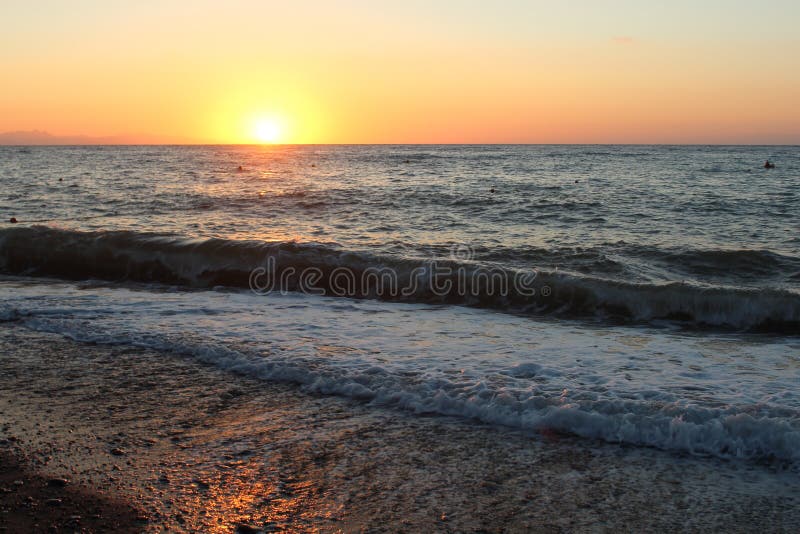 Sunset in front of the sea stock image. Image of freedom - 166150719