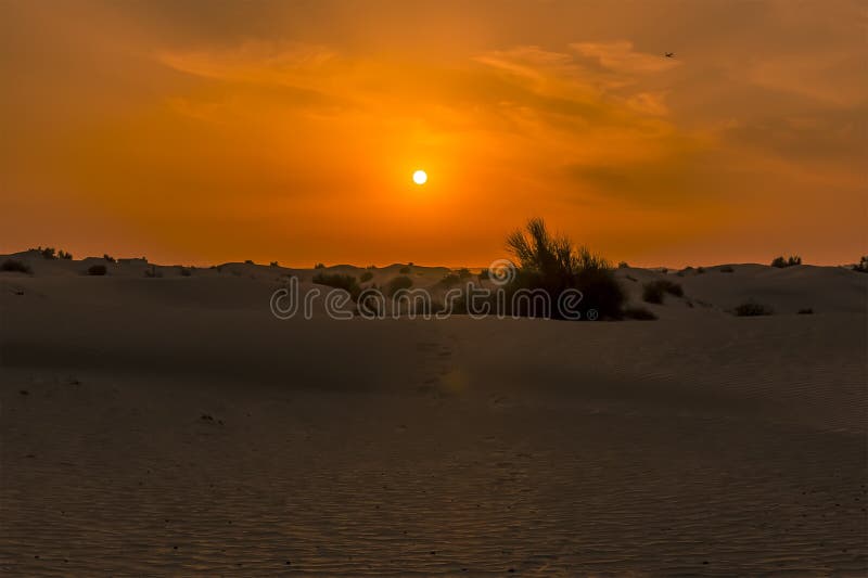 The Sun Setting in the Desert Outside Dubai, UAE Stock Photo - Image of ...