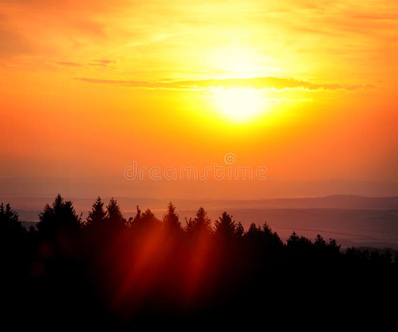 The Sun Setting Down To the Sea in a Dark Red Sunset Stock Image ...