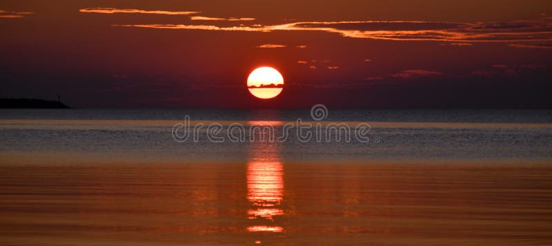 The Sun is Setting and Evening is Falling As Hope Rises Stock Photo ...