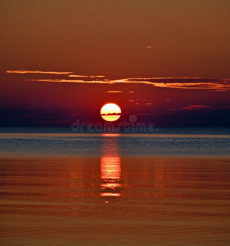 The Sun is Setting and Evening is Falling As Hope Rises Stock Photo ...