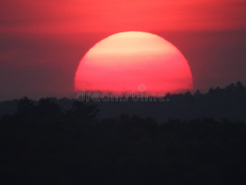 Fingerlakes Sun Setting through Northern Forest Fire Smoke Stock Image ...