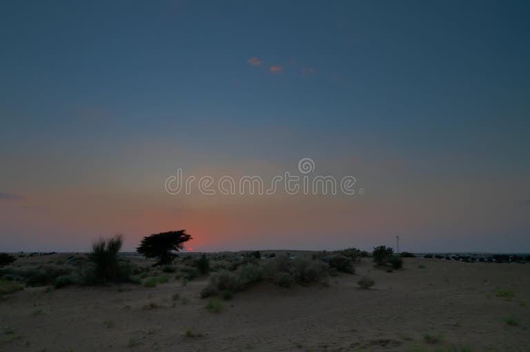 Sun Setting at the Horizon of Thar Desert,Rajasthan, India Stock Photo ...