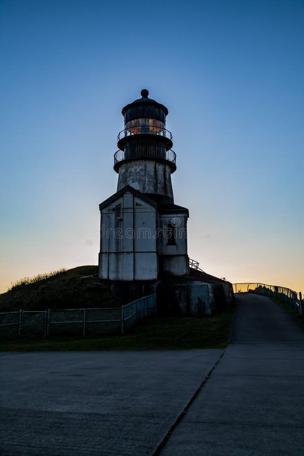Sun setting on light house stock image. Image of steeple - 237817205
