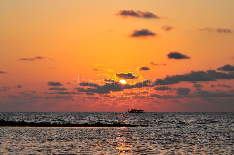 Sun setting in Maldives stock photo. Image of maldives - 40578296
