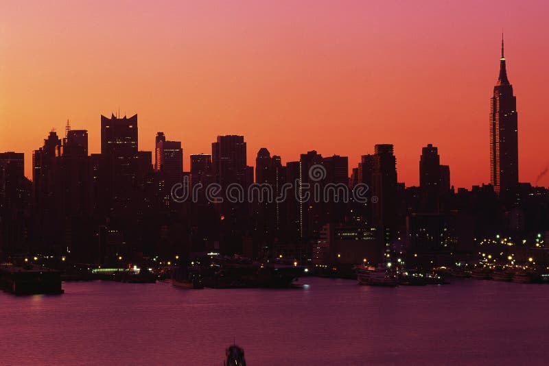 Sun setting on New York editorial photo. Image of cities - 23161461