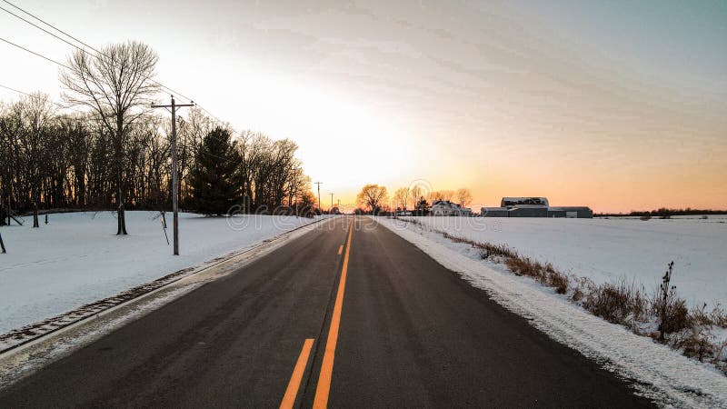 Sunsets Over the Road Next To Park Stock Image - Image of park ...