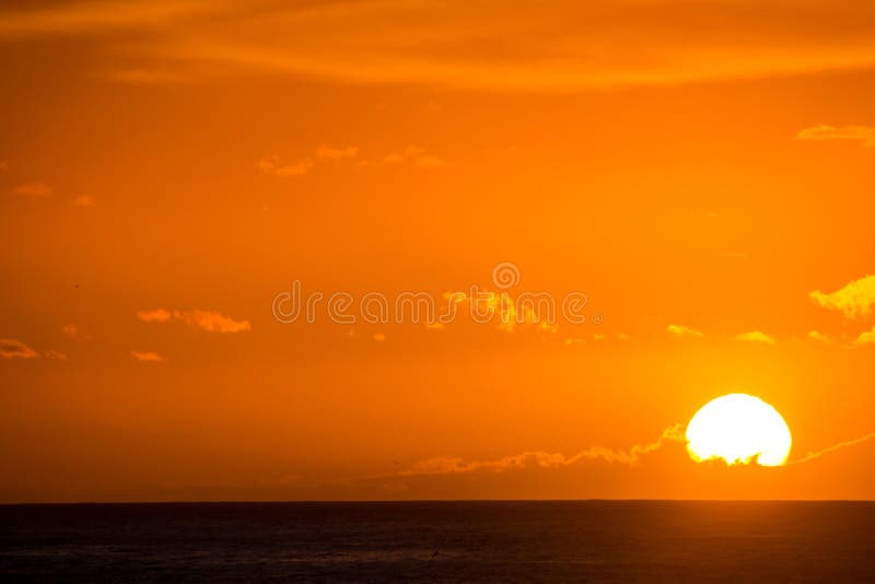 Sun Setting on the Ocean stock photo. Image of coast - 143010846